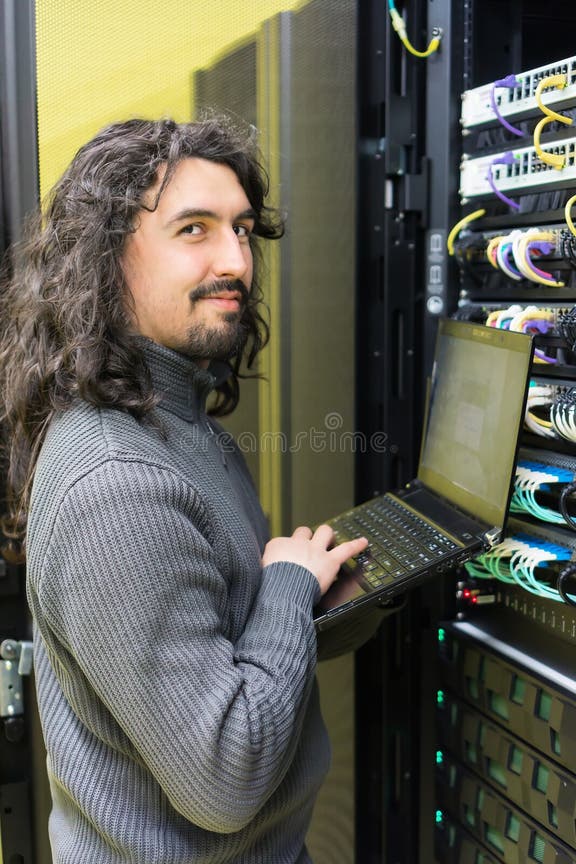 Man Working with Servers in Data Center Stock Image - Image of database ...