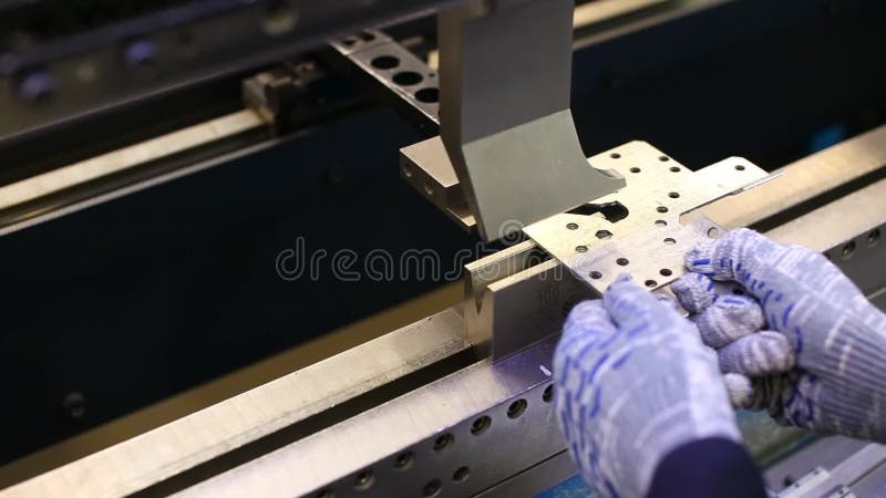 Man Working with Sheet Metal and Special Machine Tools for Bending ...