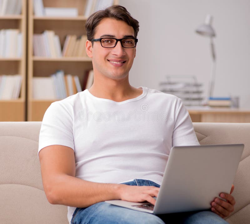 Man Working Sitting in Couch Sofa Stock Image - Image of mobile ...