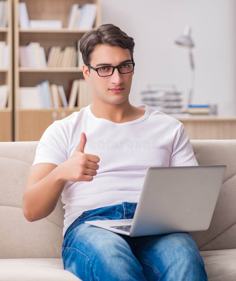 Man Working Sitting in Couch Sofa Stock Photo - Image of blogger ...