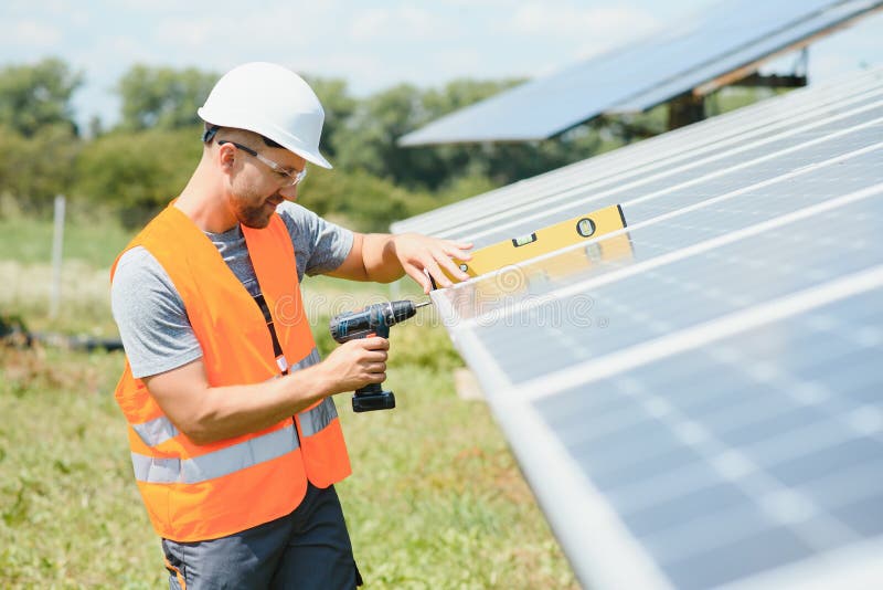 A Man Working at Solar Power Station. Stock Photo - Image of panel ...