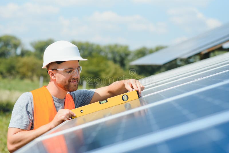 A Man Working at Solar Power Station. Stock Image - Image of ...