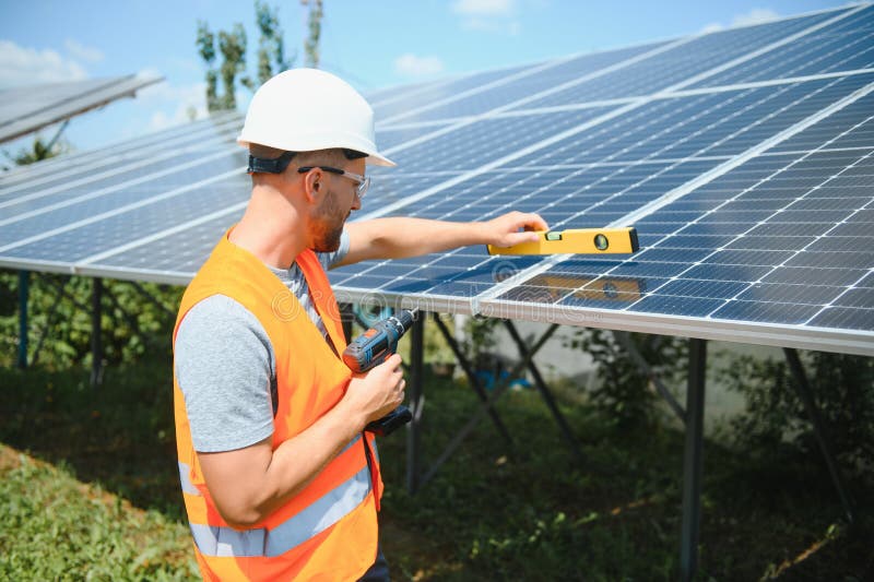 A Man Working at Solar Power Station. Stock Photo - Image of generator ...