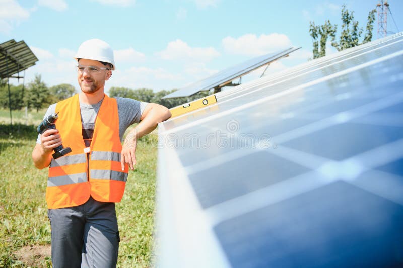 A Man Working at Solar Power Station. Stock Image - Image of electric ...