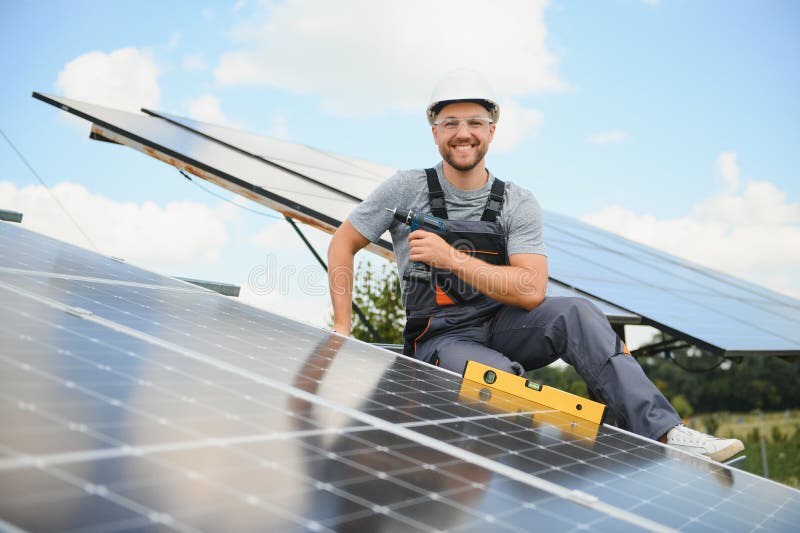 A Man Working at Solar Power Station. Stock Photo - Image of technology ...