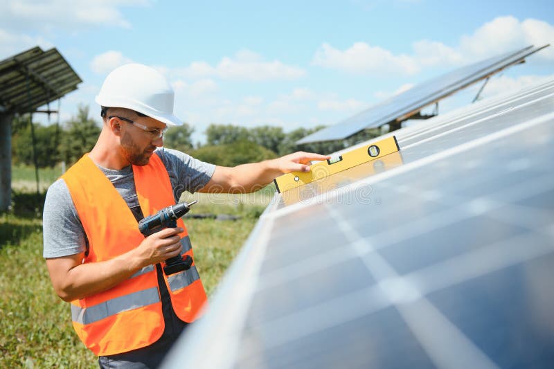 A Man Working at Solar Power Station. Stock Photo - Image of ...