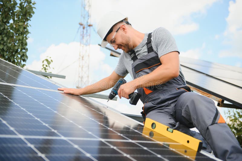 A Man Working at Solar Power Station. Stock Photo - Image of installer ...