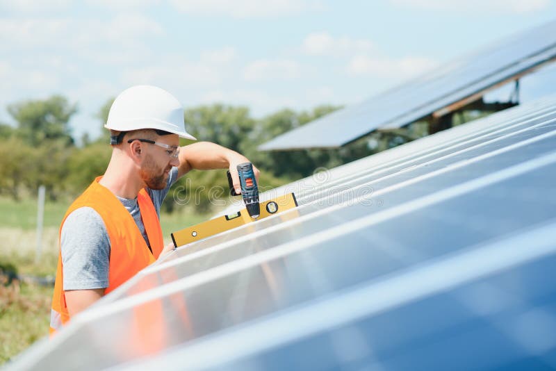 A Man Working at Solar Power Station. Stock Image - Image of ...
