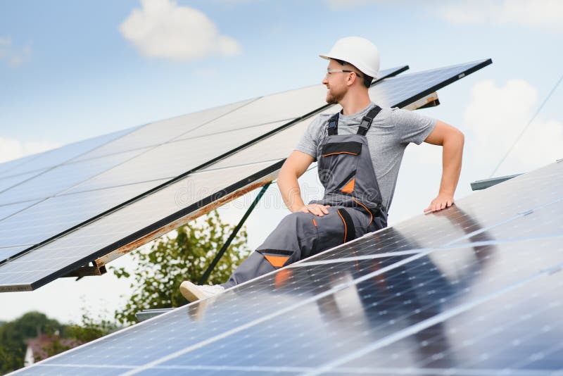 A Man Working at Solar Power Station. Stock Photo - Image of panel ...