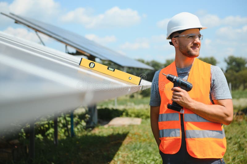 A Man Working at Solar Power Station. Stock Photo - Image of install ...