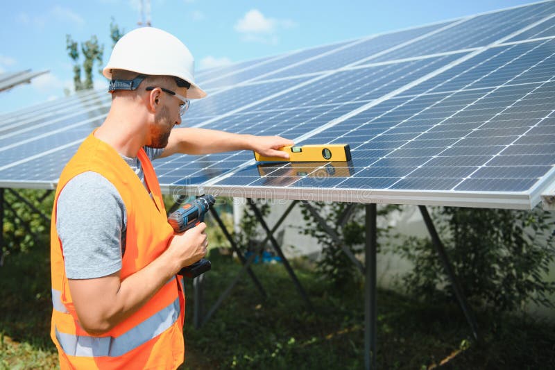 A Man Working at Solar Power Station. Stock Photo - Image of energy ...