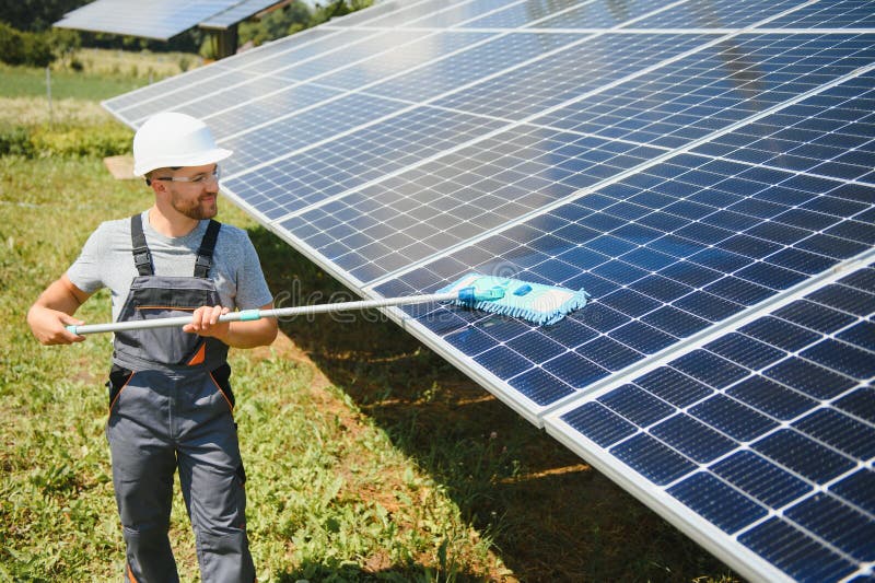 A Man Working at Solar Power Station. Stock Photo - Image of safety ...