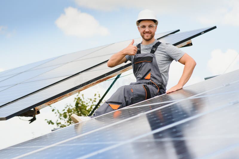 A Man Working at Solar Power Station. Stock Image - Image of ...