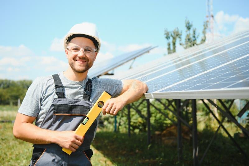 A Man Working at Solar Power Station. Stock Photo - Image of ...