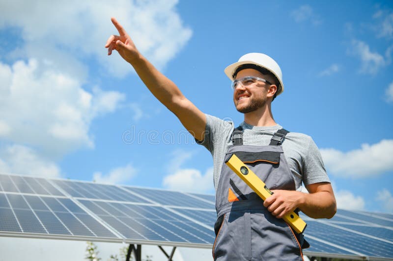 A Man Working at Solar Power Station. Stock Photo - Image of technology ...