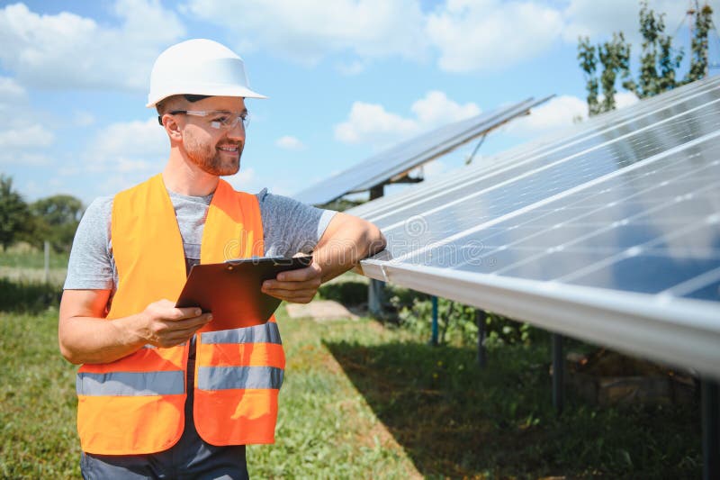A Man Working at Solar Power Station. Stock Photo - Image of technology ...