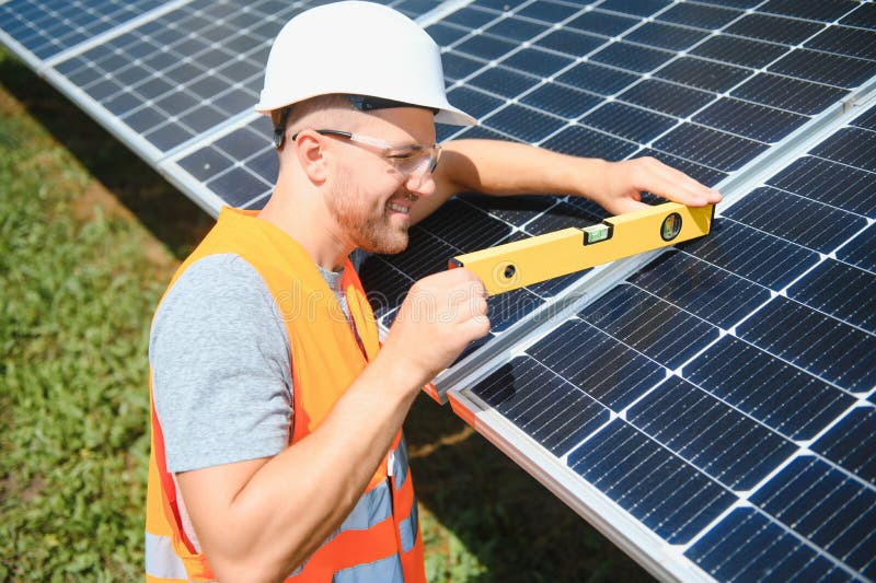 A Man Working at Solar Power Station. Stock Photo - Image of panel ...