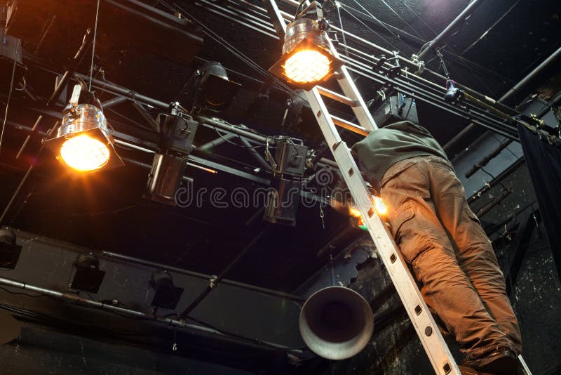 Man Working on Stage Lighting Stock Image - Image of lighting, stage ...