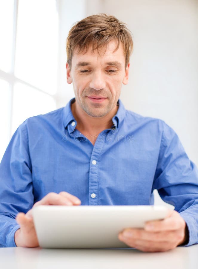 Man Working with Tablet Pc at Home Stock Photo - Image of handsome ...