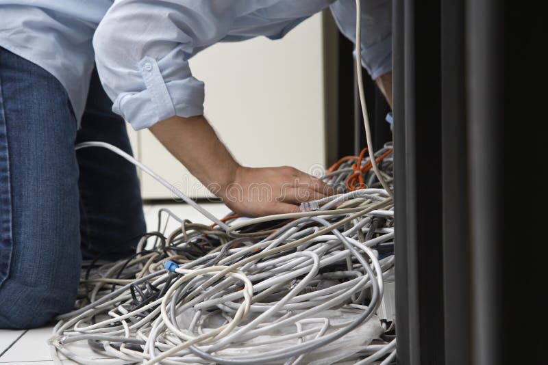 Man Working on Tangled Computer Wires Stock Image - Image of connection ...