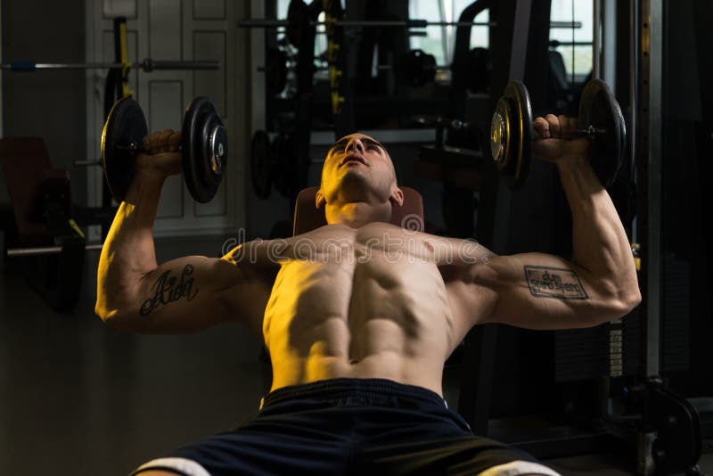 Man Working Triceps and Chest with Dumbbells Stock Image - Image of ...