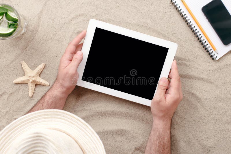 Man Working Using Tablet on the Beach Stock Image - Image of black ...