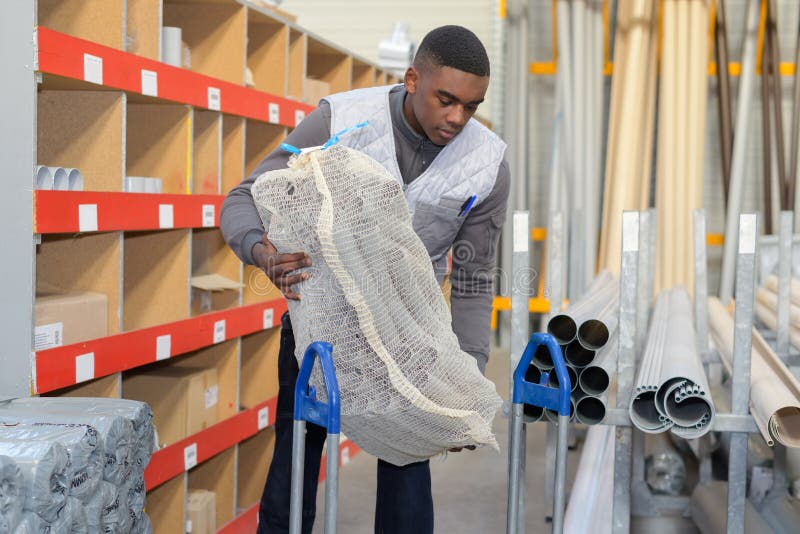 Man working in warehouse stock photo. Image of repairman - 148582422