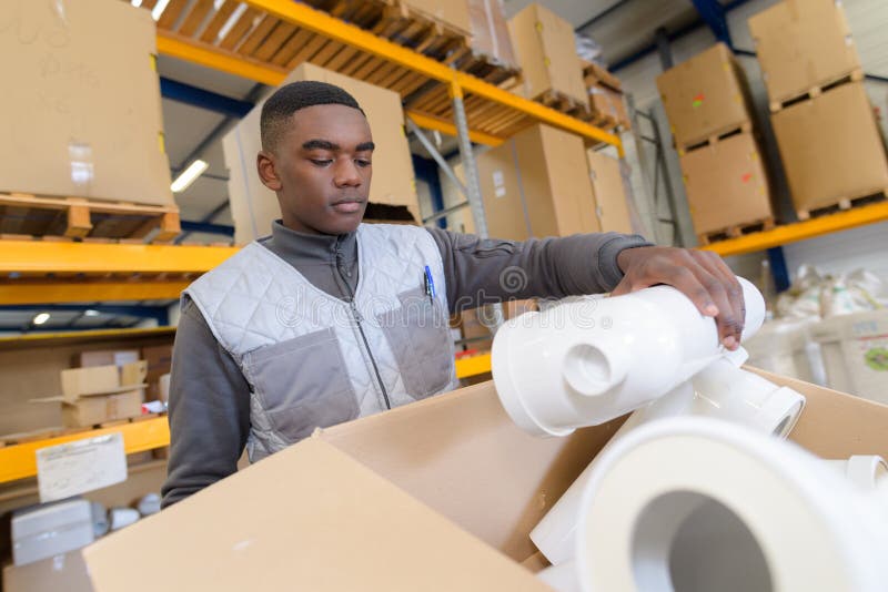 Man working in warehouse stock photo. Image of vertical - 240331928