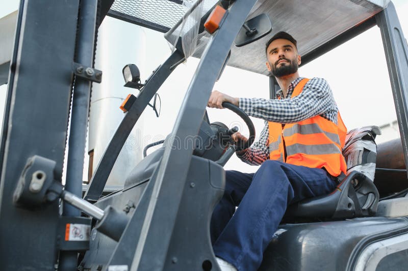 Man Working at Warehouse and Driving Forklift Stock Photo - Image of ...