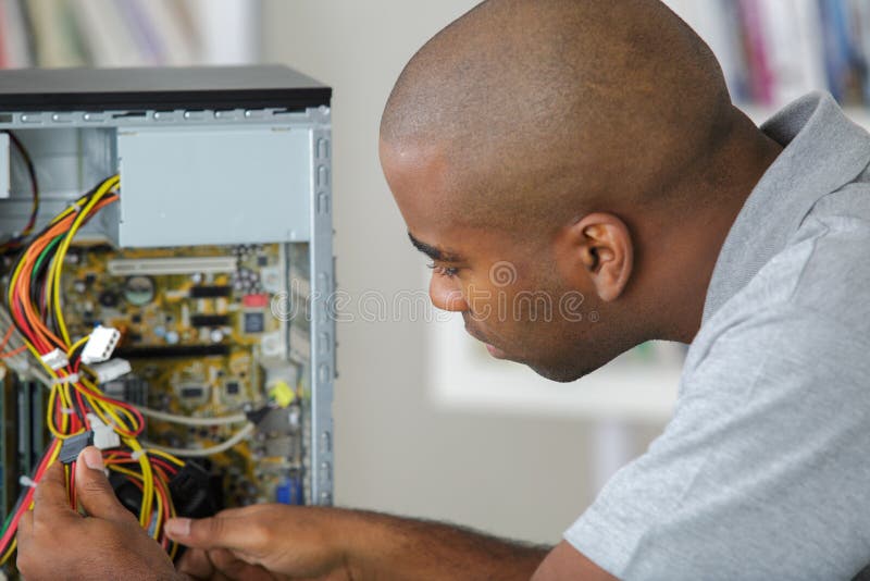 Man Working with Wiring on the Dashboard at Service Station Stock Photo ...