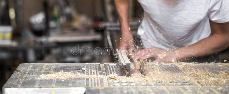 A Man Working with Wood Product on the Machine Stock Photo - Image of ...