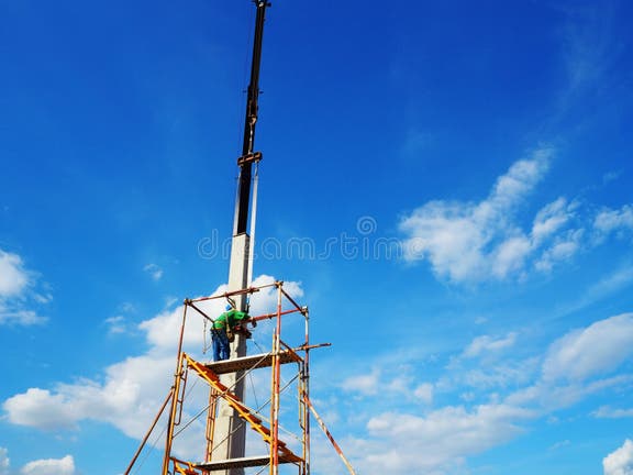 Man Working on the Working at Height on Construction Stock Photo ...