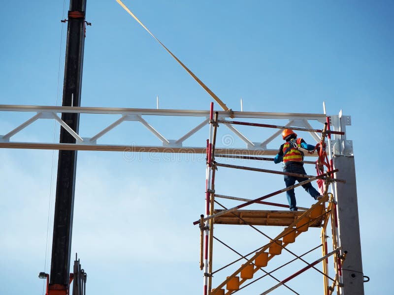 Man Working on the Working at Height on Construction Stock Photo ...