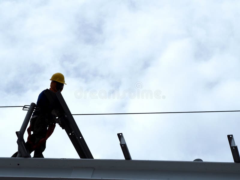 Man Working on the Working at Height on Construction Stock Photo ...