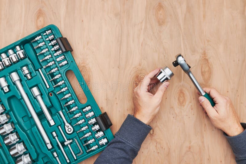 Man Working in Workshop Using Many Tools. Wrench, Spanner, Calliper and ...