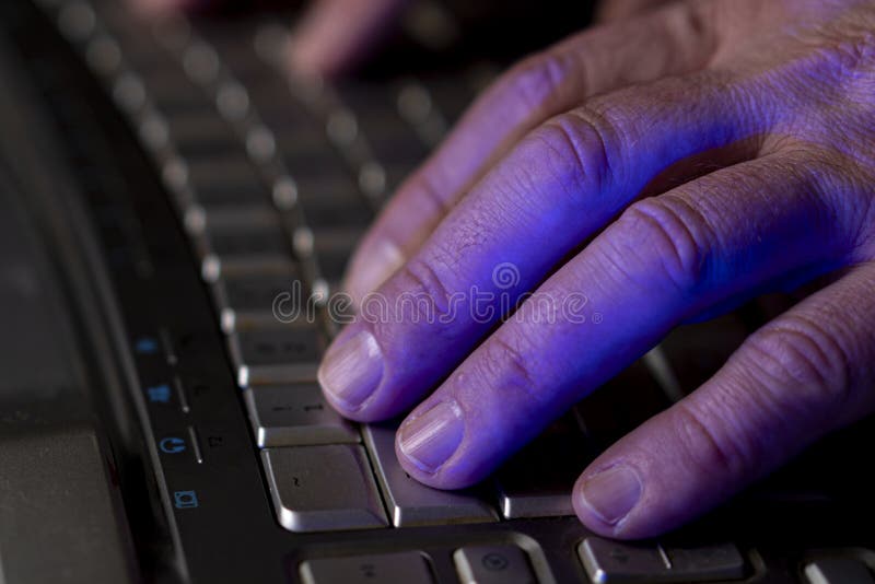 A Man Works At A Computer Hands Of A Man On The Keyboard Close Up Programmer Or Hacker Soft