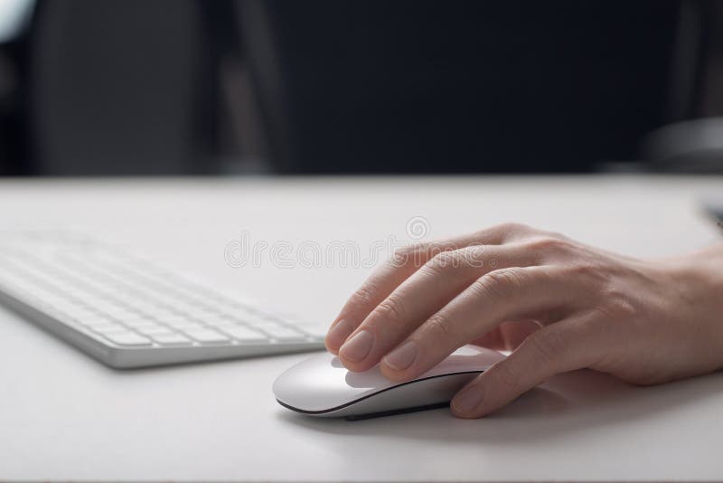 A Man Works at a Computer. Computer Mouse Close-up Stock Image - Image ...