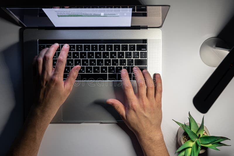 A Man Works at a Computer at Night, Top View. Editorial Photo - Image ...