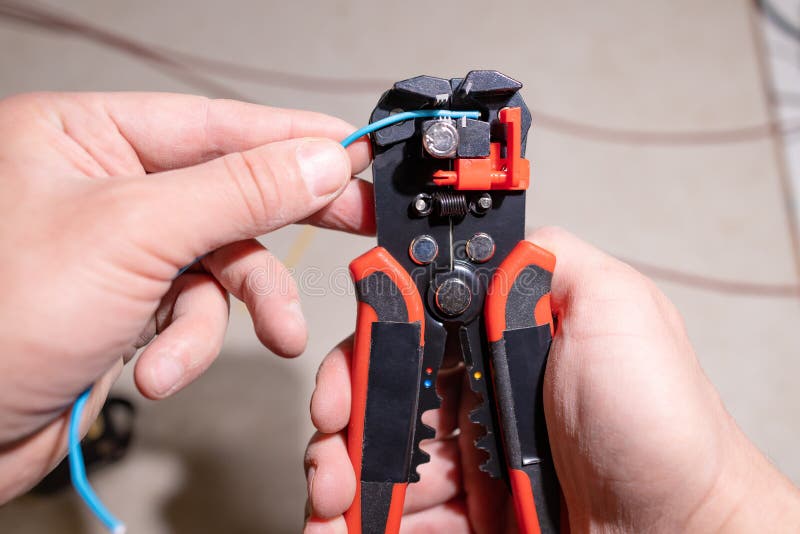 Man Works with Electrical Wires Using Tools, Fixing Socket at Home ...