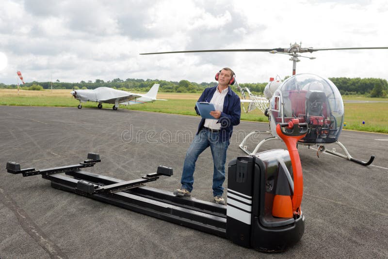 Man Works on Helicopter Deck Offshore Stock Photo - Image of offshore ...