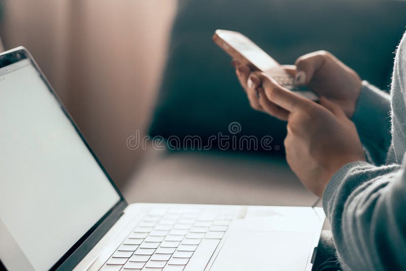 A Man Works at a Laptop. Checks the Browser Stock Photo - Image of ...