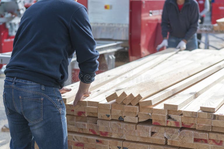 Man Works Sawmill Folding Boards Stock Photos - Free & Royalty-Free ...