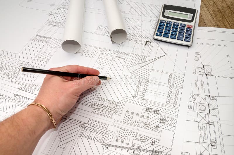 Man Works with the Technical Drawing, Machine Parts Stock Photo - Image ...