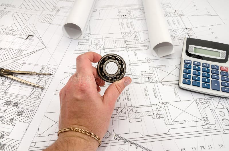 Man Works with the Technical Drawing, Machine Parts Stock Image - Image ...