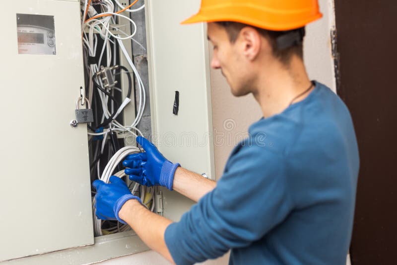 A Man Works with Telecommunications. the Technician Switches the ...
