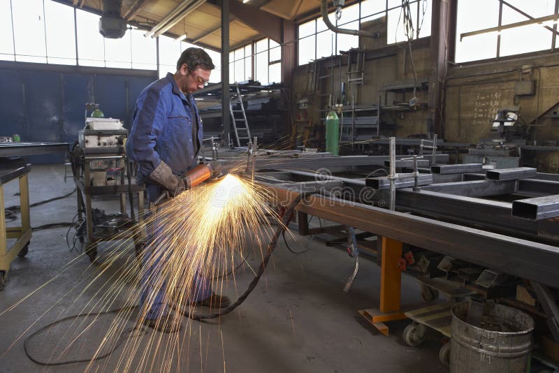 Man at workshop stock image. Image of manual, energy - 12037637