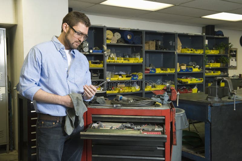 Serious Man in Workshop with Tools Stock Photo - Image of leisure ...