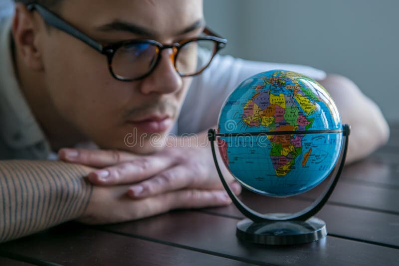Man with world globe stock image. Image of style, handsome - 51361033