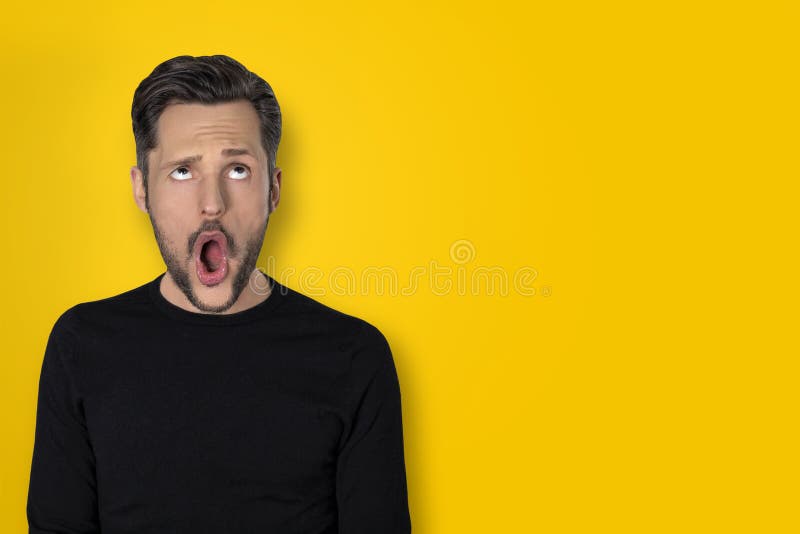 Man with a Wow Expression on a Yellow Background Stock Image - Image of ...