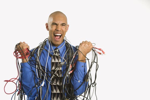 Man wrapped in cables. stock photo. Image of high, confused - 2431812